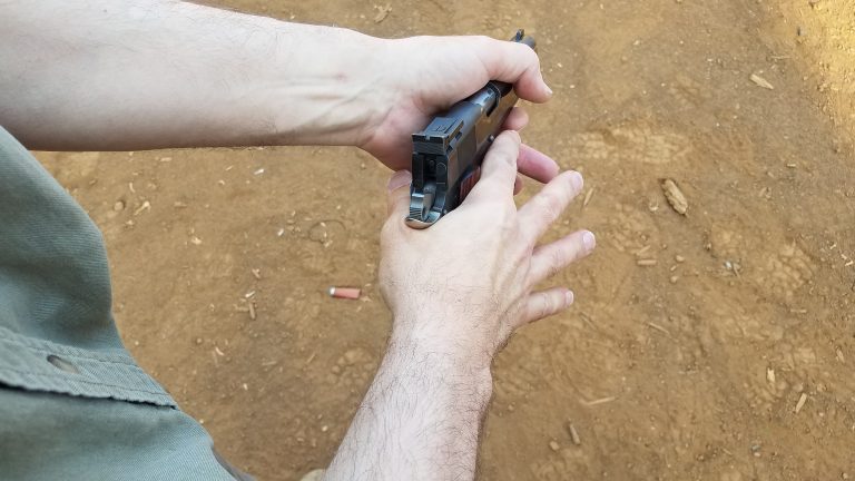 How to Hold a Pistol, Aim and Shoot Correctly - holdrightedge.com