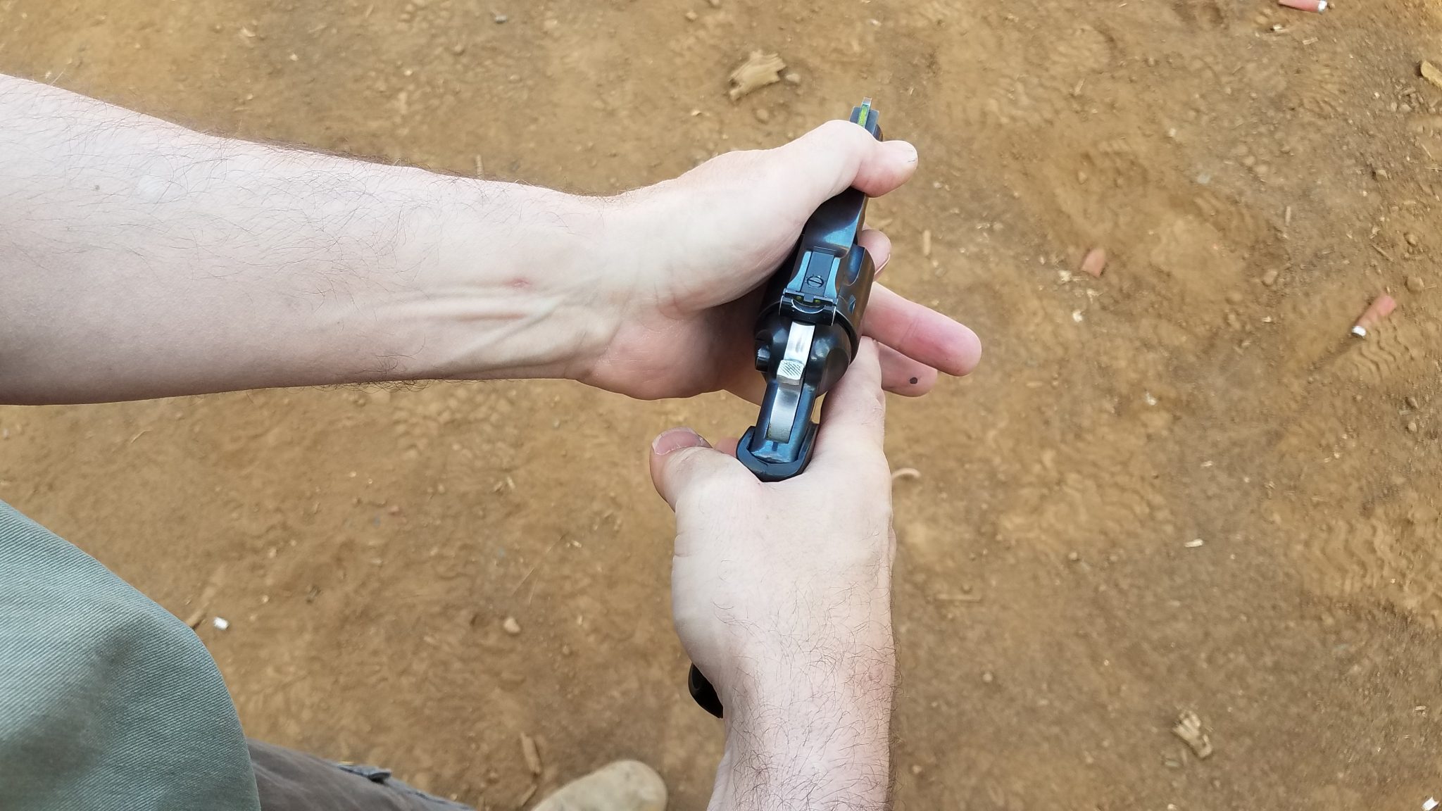 How to Hold a Pistol, Aim and Shoot Correctly - holdrightedge.com